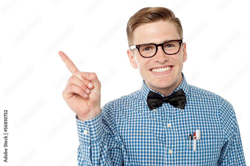 Smiling nerd pointing away 素材庫相片 | Adobe Stock Smiling nerd pointing away 素材庫相片 | Adobe Stock