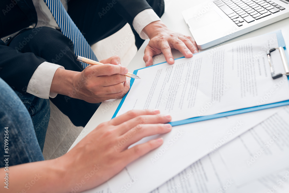 Signing a contract Stock Photo | Adobe Stock