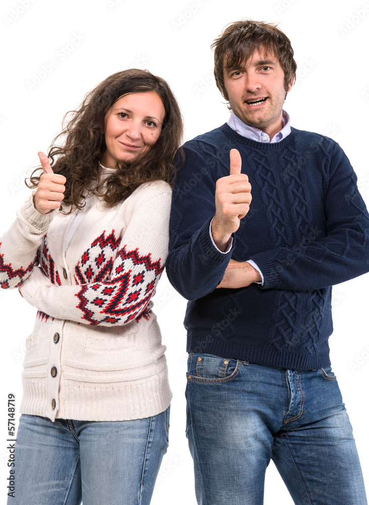 Smiling man and woman showing thumbs up sign Stock Photo | Adobe Stock