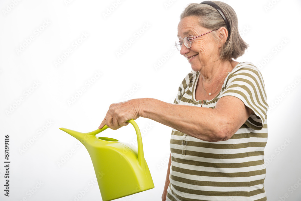 Alte Frau mit Giesskanne Stock Photo | Adobe Stock