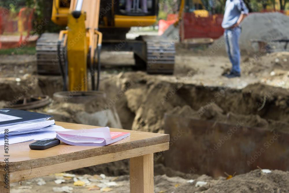 engineer and his working desk with work orders, site engineer co Stock ...