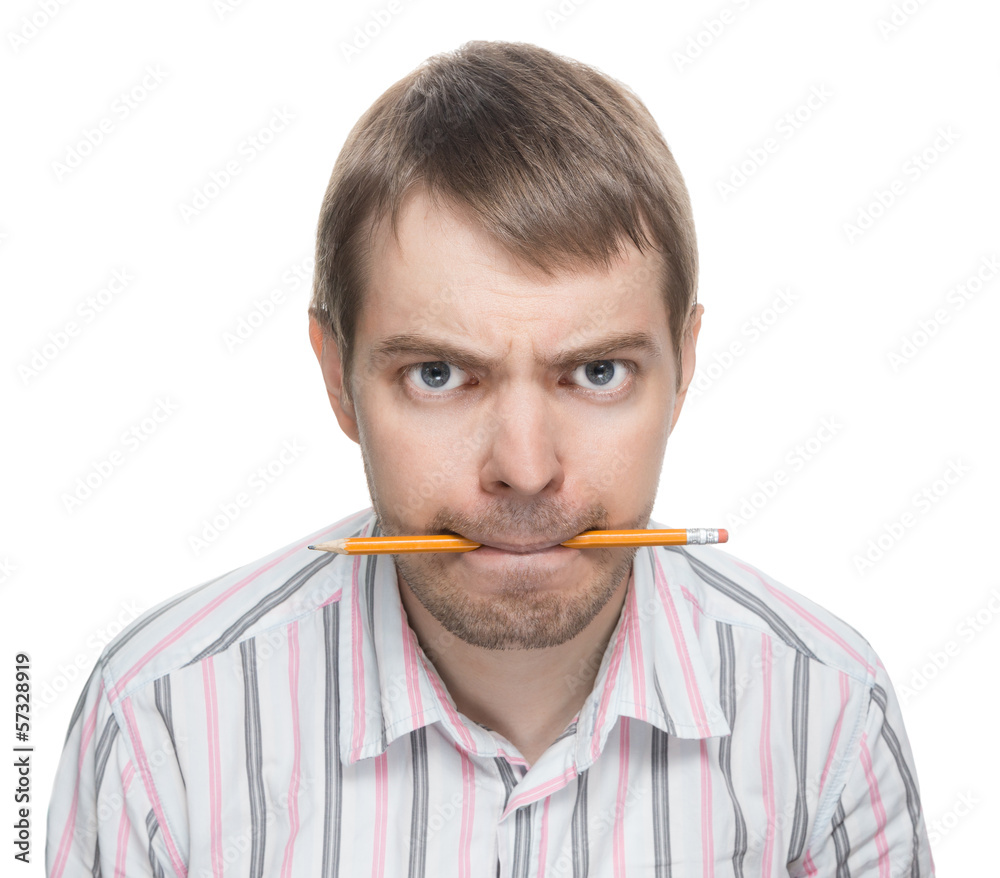 Young angry man with pencil. Isolated on white. Stock Photo | Adobe Stock