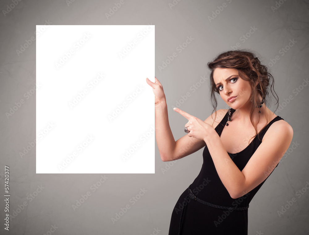 Young woman presenting white paper copy space Stock Photo | Adobe Stock
