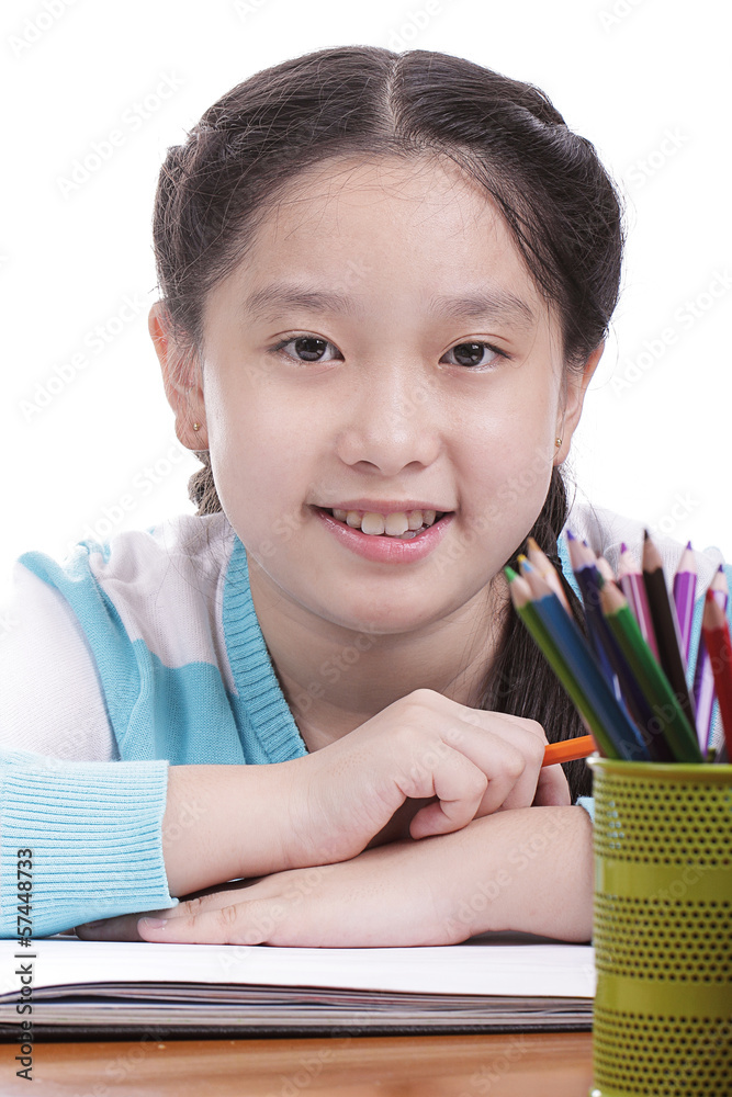 Student girl doing homework Stock Photo | Adobe Stock