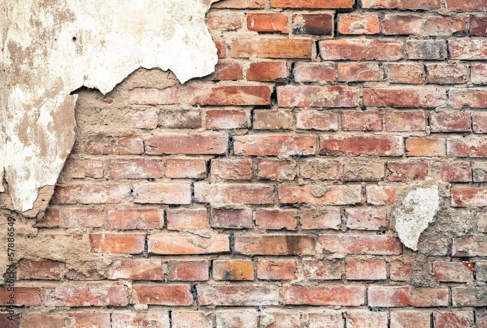 Ziegelsteinmauer mit abgebröckeltem Putz Stock-Foto | Adobe Stock