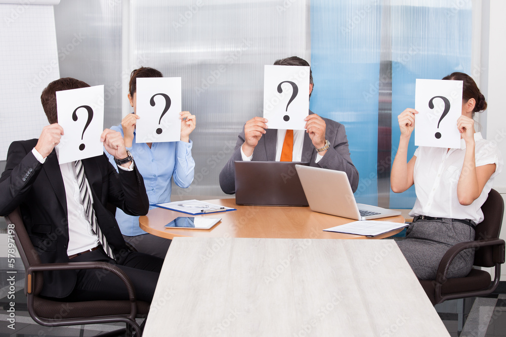 Businesspeople Holding Question Mark Sign Stock Photo | Adobe Stock