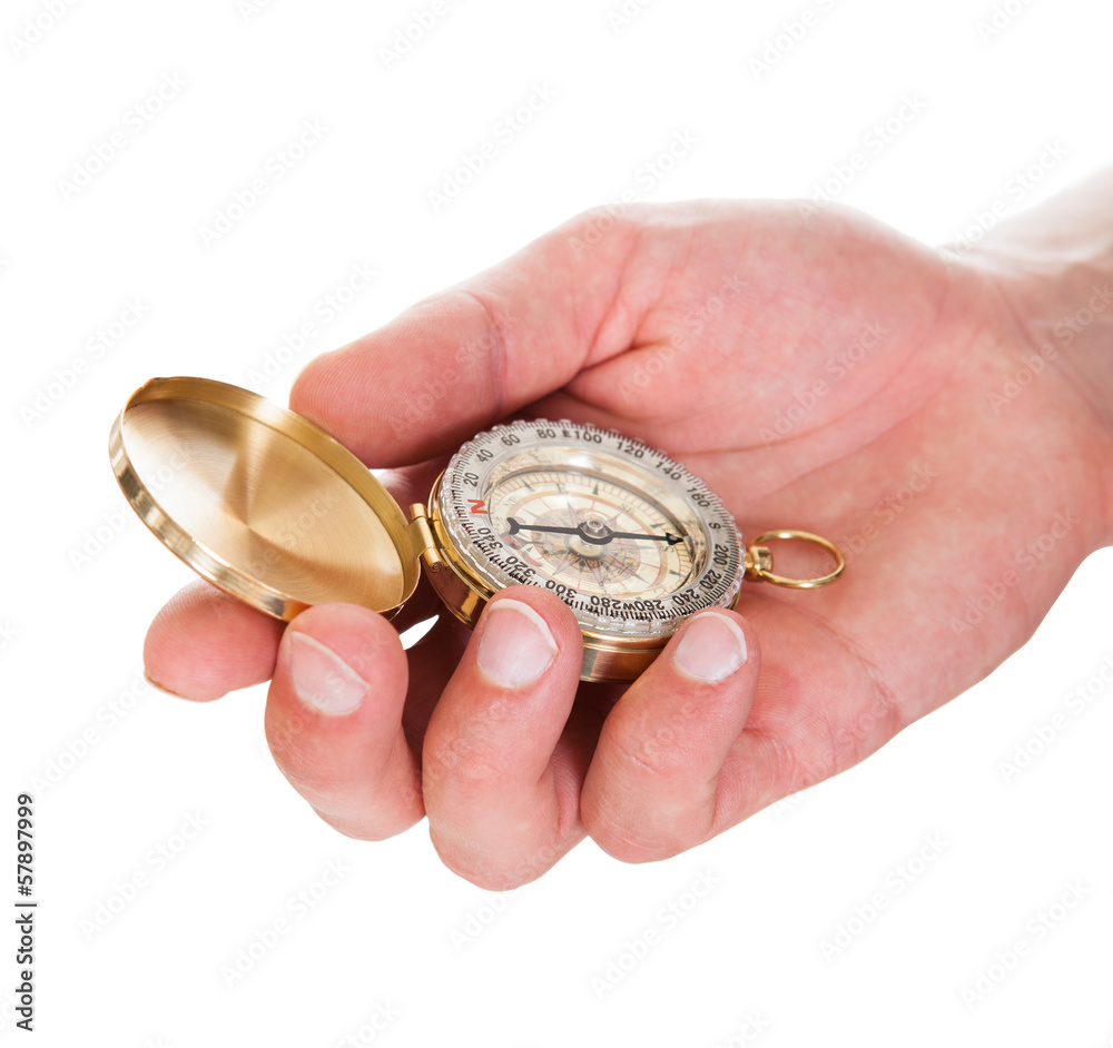 Hand Holding Compass Stock Photo | Adobe Stock