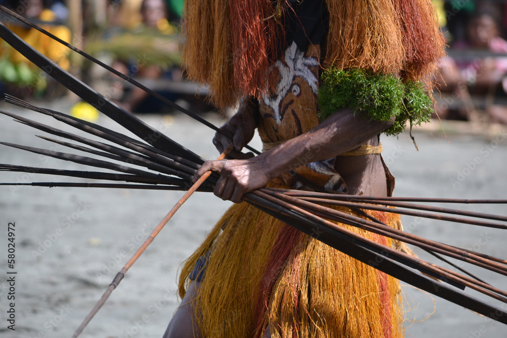 Man with bow and arrow traditional tribal weapon Stock-Foto | Adobe Stock