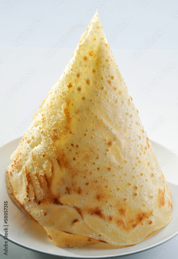 Roti canai, roti tisu, traditional south indian fried bread Stock Photo ...