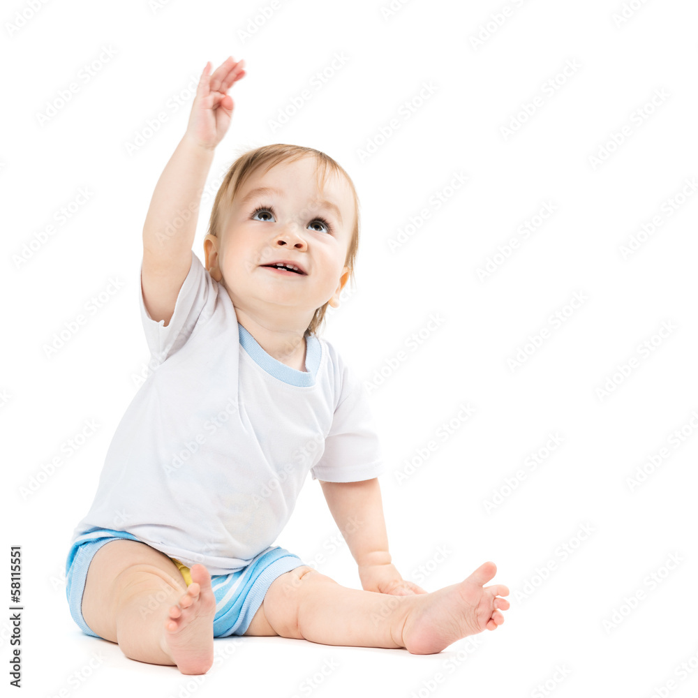 baby sitting and points his hand up Stock Photo | Adobe Stock