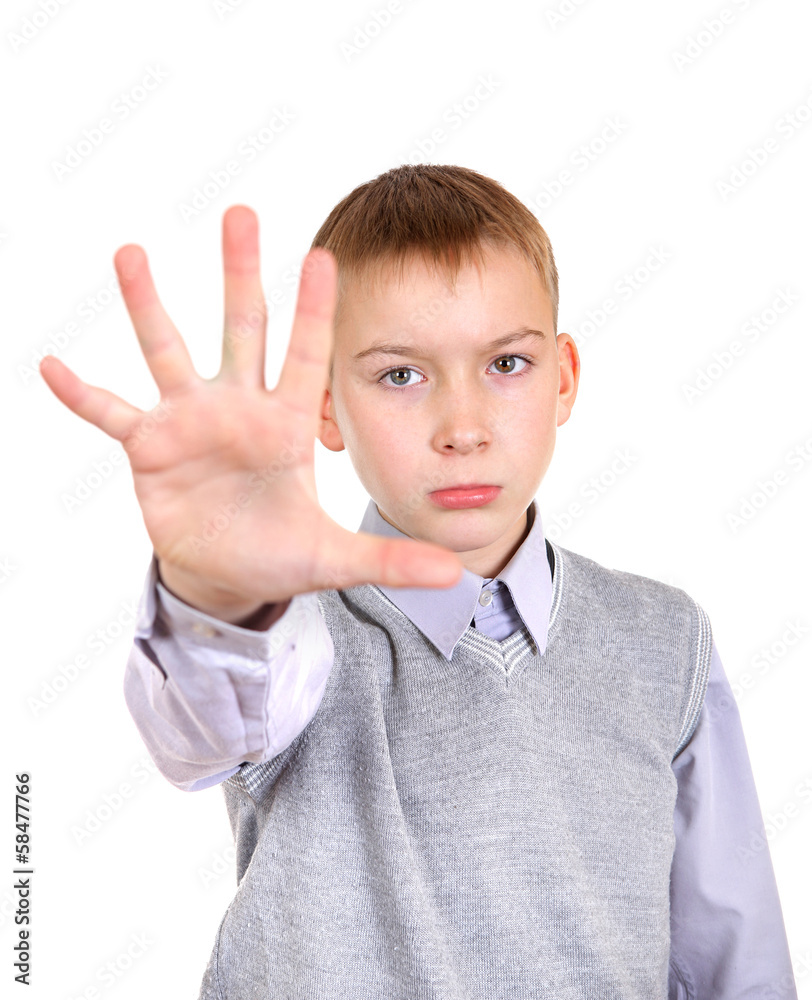 Boy shows Stop hand gesture Stock Photo | Adobe Stock Boy shows Stop hand gesture Stock Photo | Adobe Stock