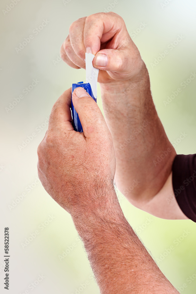 Hands pulling tissue paper out of the pack Stock Photo | Adobe Stock