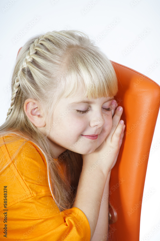 Cute little towhead girl sleeping on chair Stock Photo | Adobe Stock