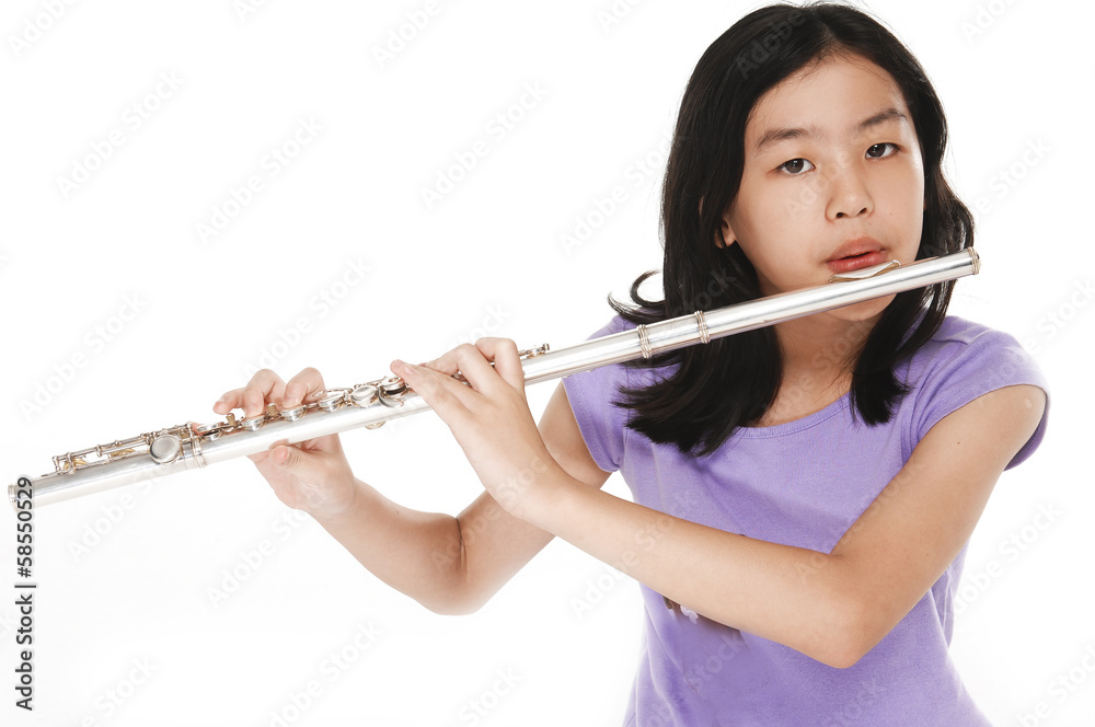 cute girl playing transverse flute on white background Stock Photo ...