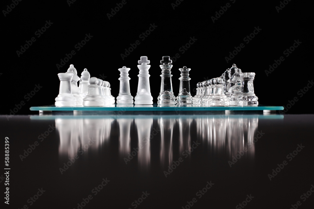 glass chess board with chess pieces Stock Photo | Adobe Stock