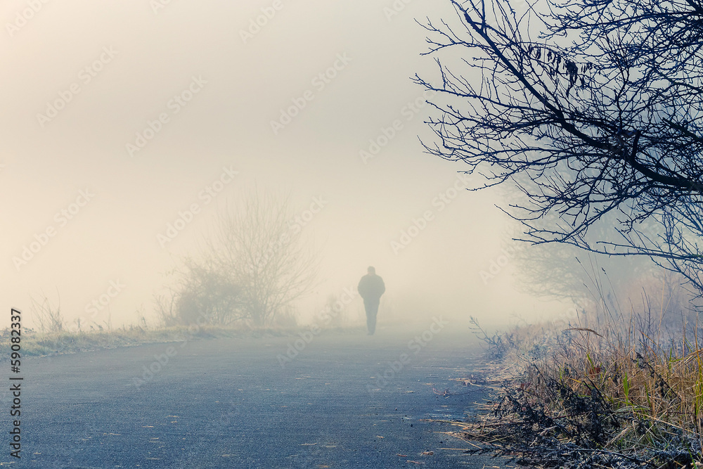 men silhouette in the fog Stock Photo | Adobe Stock