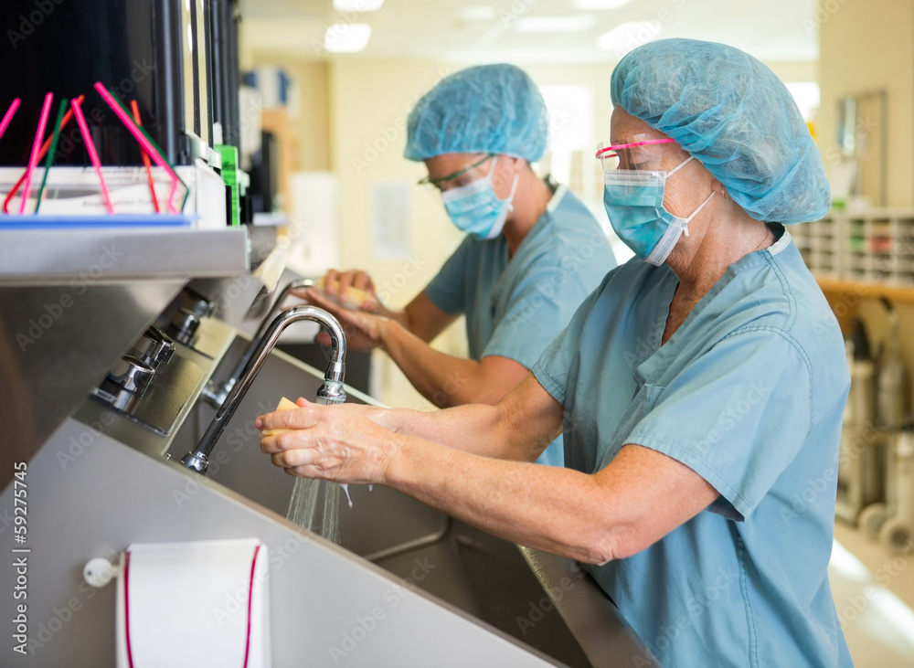 Scrubbing Hands and Arms Before Surgery Stock Photo | Adobe Stock