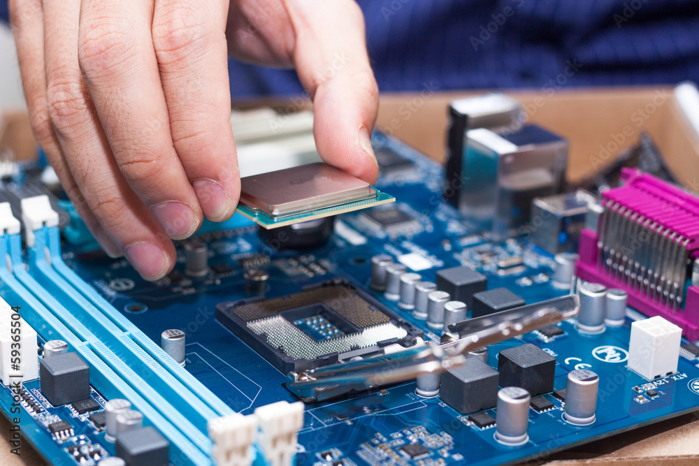 Assembling high performance personal computer, inserting CPU, processor ...