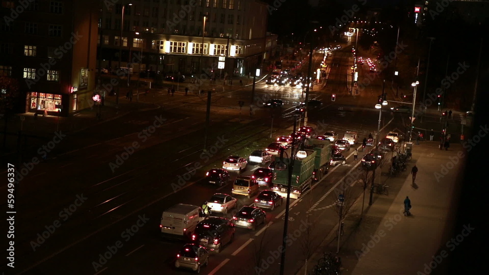 Cars waiting at traffic light at intersection Stock Video | Adobe Stock