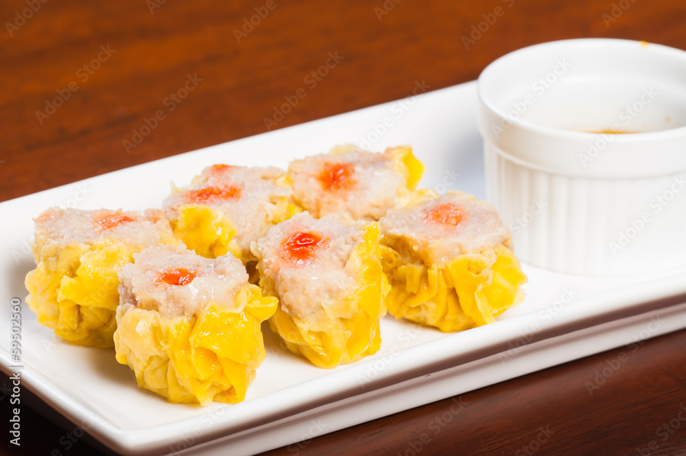 pork siomai with hot chili soy sauce Stock Photo | Adobe Stock