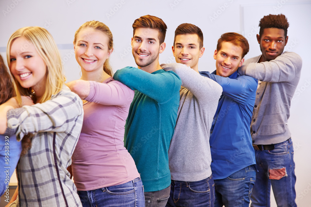 Teenager stehen hintereinander in der Schule Stock Photo | Adobe Stock