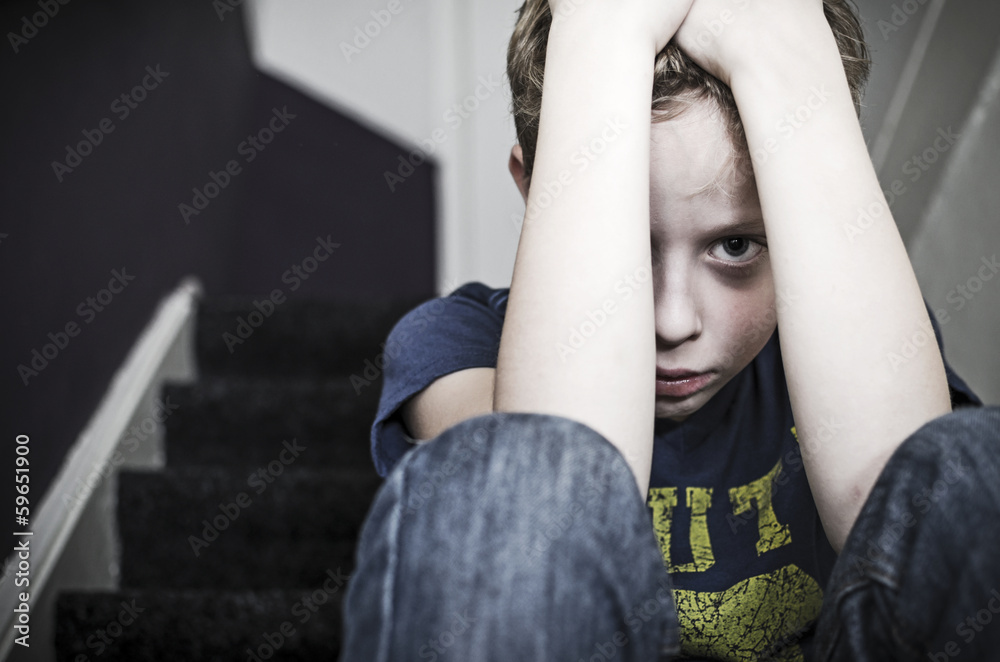 Depressed little boy Stock-Foto | Adobe Stock