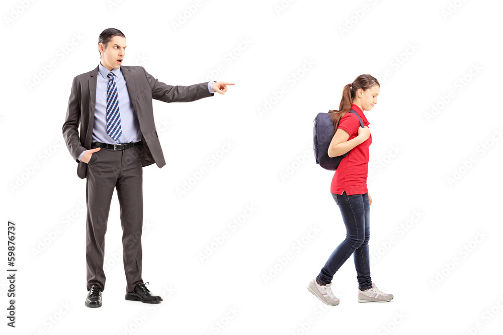 Full length portrait of angry father yelling at his daughter Stock ...