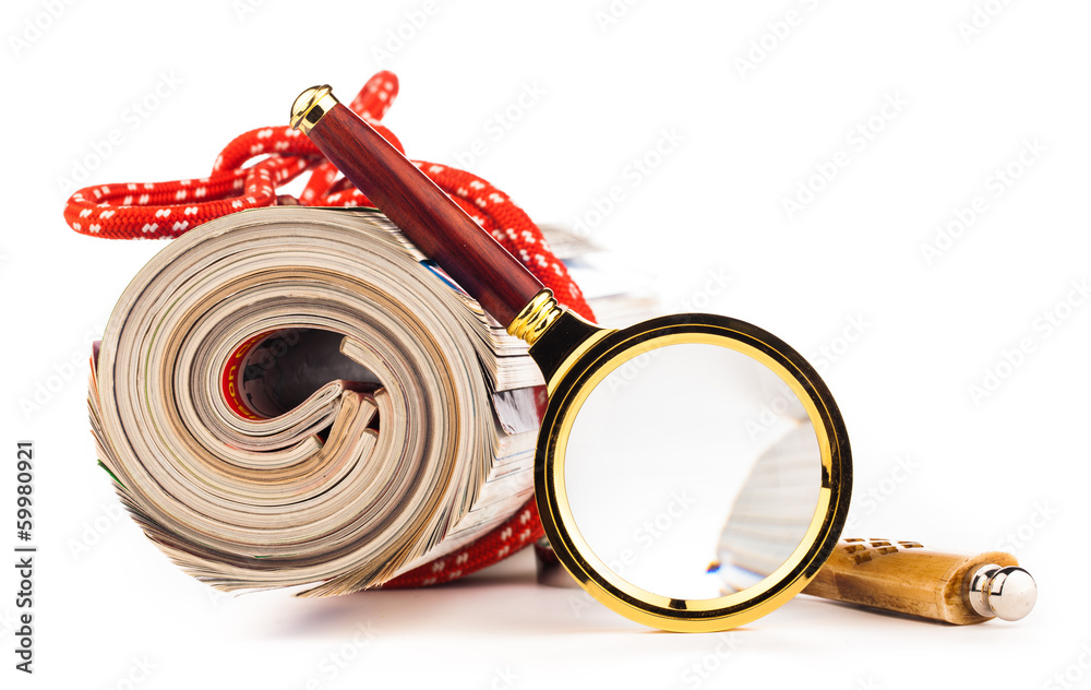 role of newspapers and magnifying glass Stock Photo | Adobe Stock