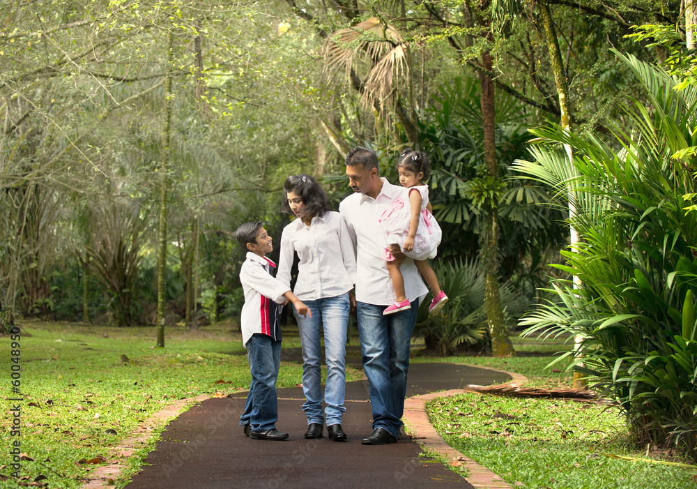happy indian family walking outdoor in the park Stock Photo | Adobe Stock