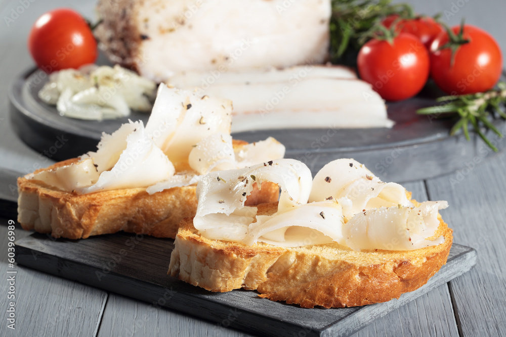 lardo salato su fette di pane Stock Photo | Adobe Stock