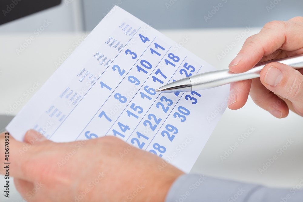 Hand Holding Calendar And Pen Stock Photo | Adobe Stock