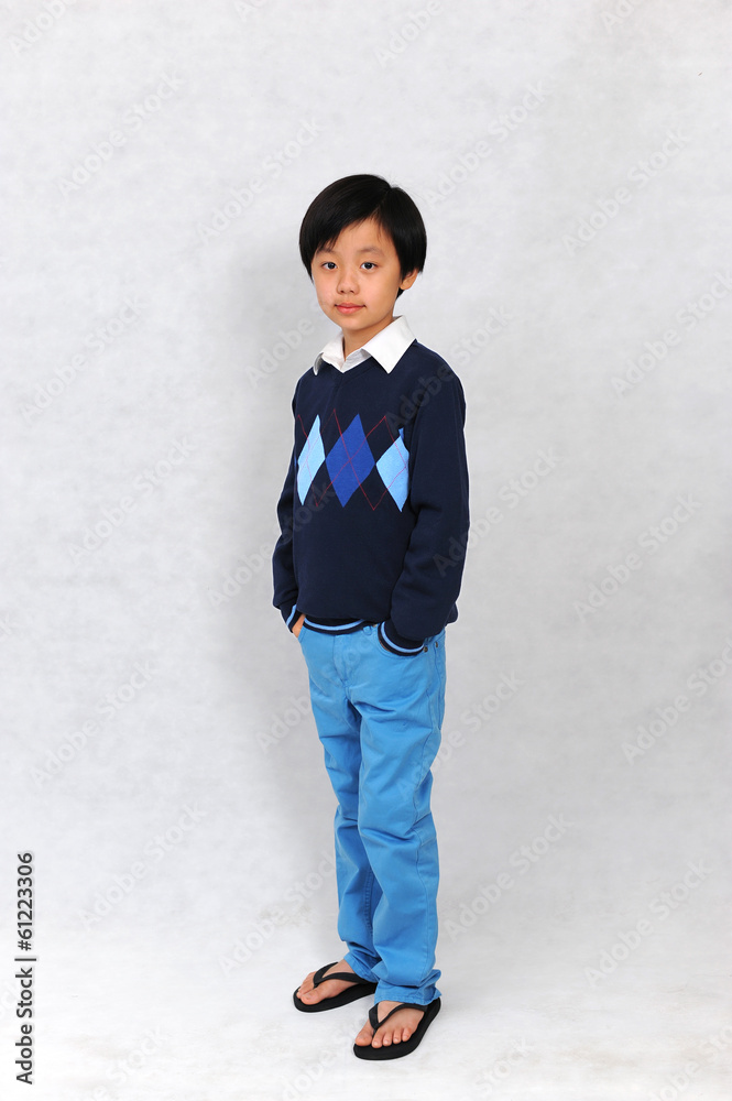 Cute Asian boy model posing in casual wear Stock Photo | Adobe Stock