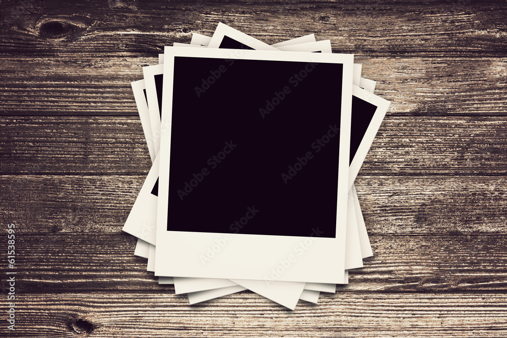collection of Polaroid retro frames on wood Stock Photo | Adobe Stock