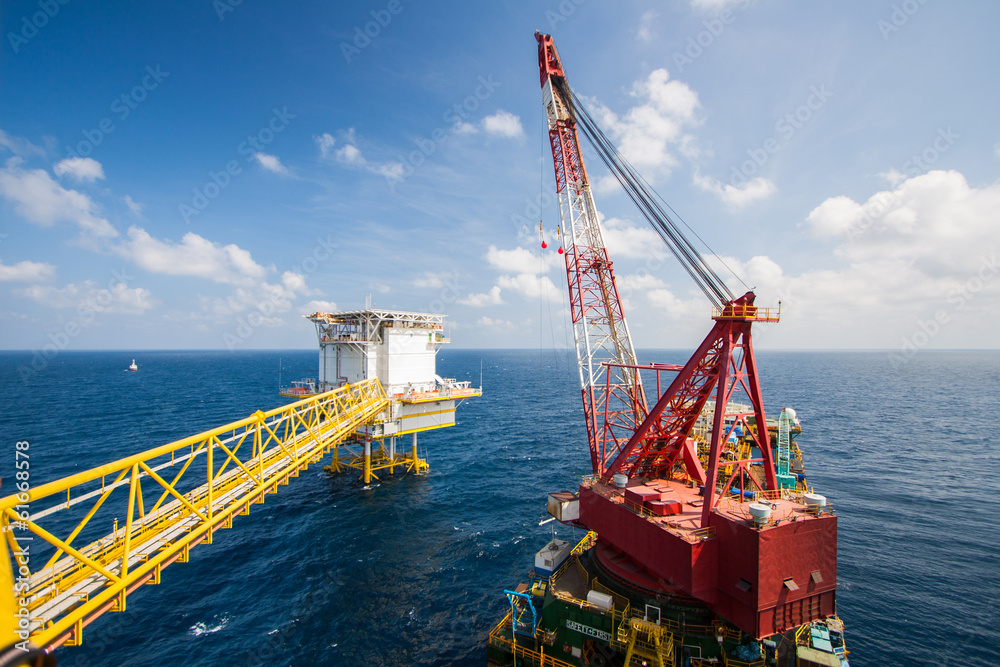 Large crane vessel installing the platform in offshore Stock Photo ...