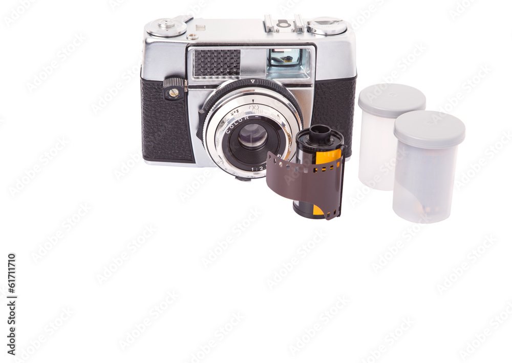 Old retro analog camera with new film roll over white background Stock ...