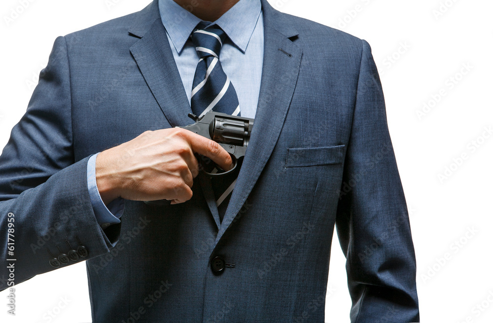 Gangster pulls out a gun Stock Photo | Adobe Stock
