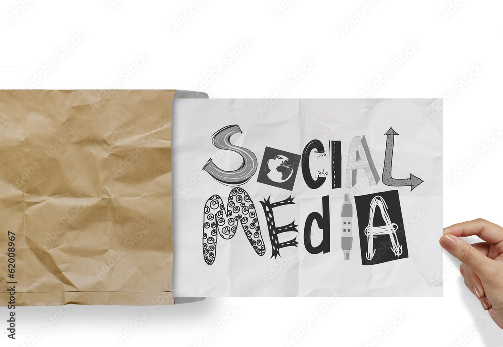 hand pulling crumpled paper from envelope with design word SOCIA Stock ...