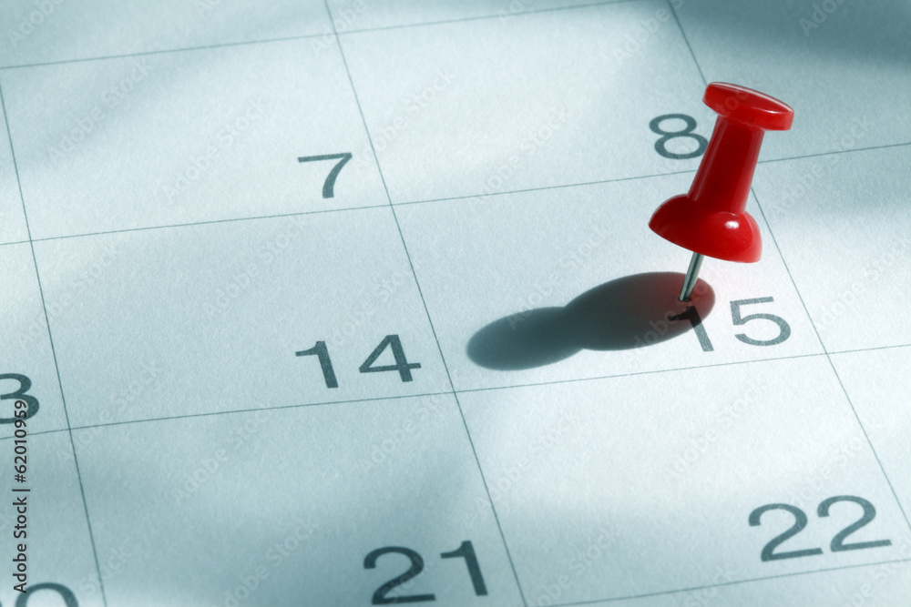 Push-pin in calendar Stock Photo | Adobe Stock