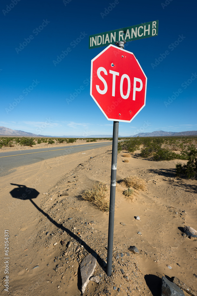 Stop sign on Indian Ranch road in Death Valley Stock Photo | Adobe Stock