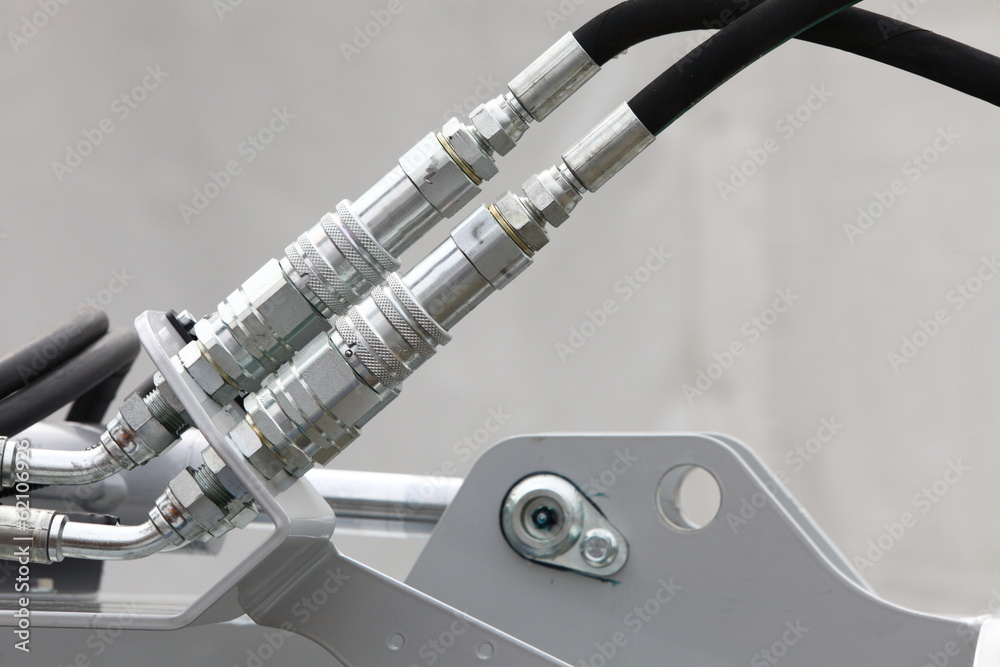 Foto Stock Hydraulic connections of a machinery industrial detail ...