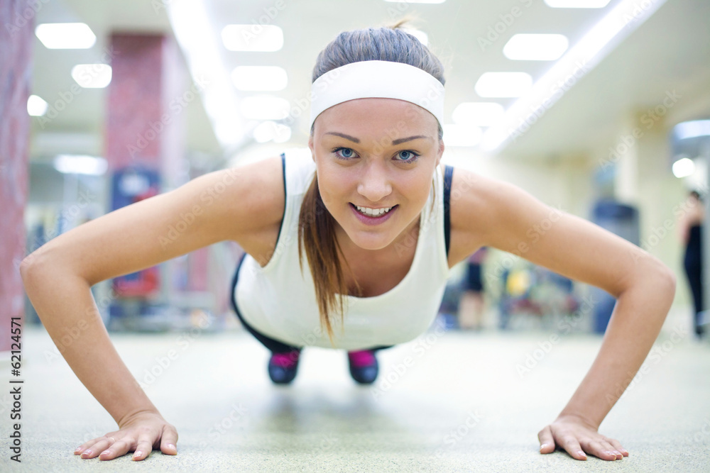 woman in gym Stock Photo | Adobe Stock