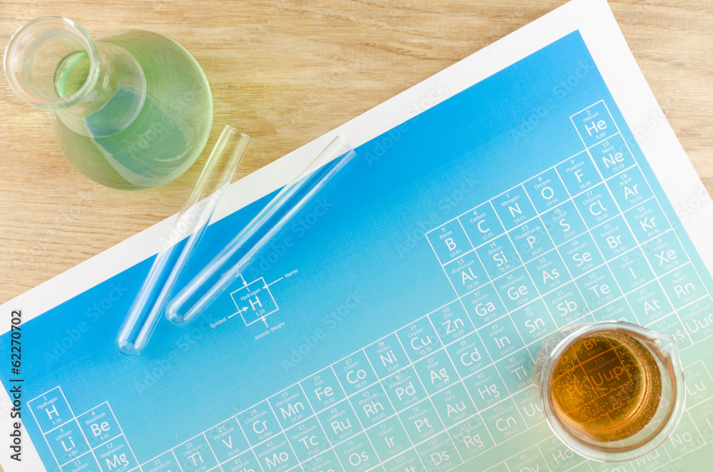 Laboratory glassware and periodic table of elements. Stock Photo ...