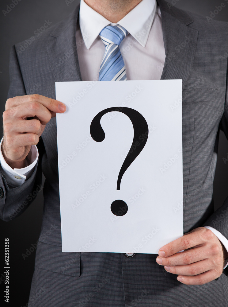 Businessperson With A Question Mark Sign Stock Photo | Adobe Stock