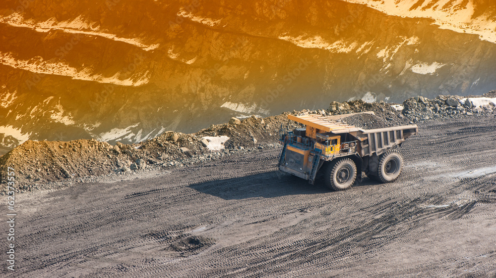 Dump Truck on the Road in a Open-Pit. Pit Dumper Truck Quarry Mining ...
