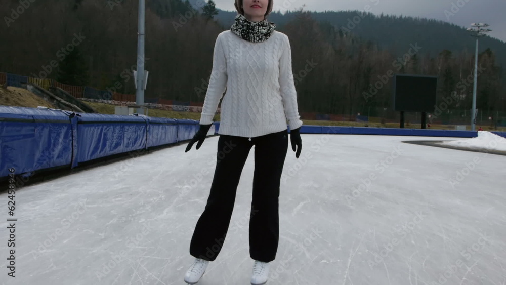 woman figure skating at an open outdoor speed skating rink appro Stock ...