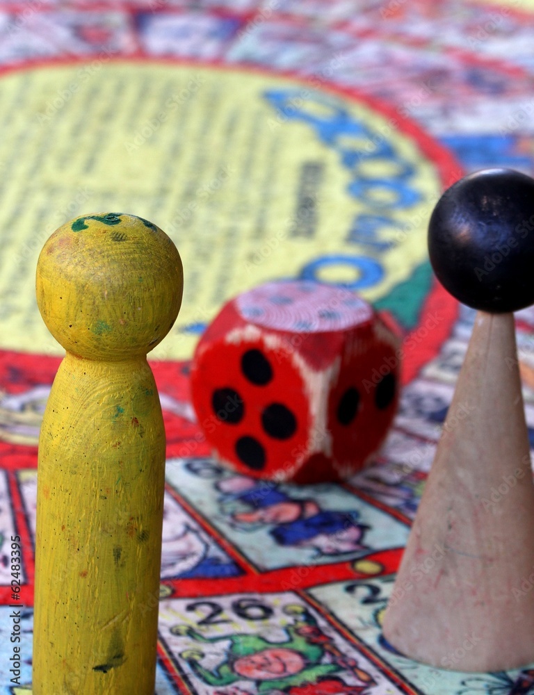 snakes and ladders with giant nut and two stones Stock Photo | Adobe Stock