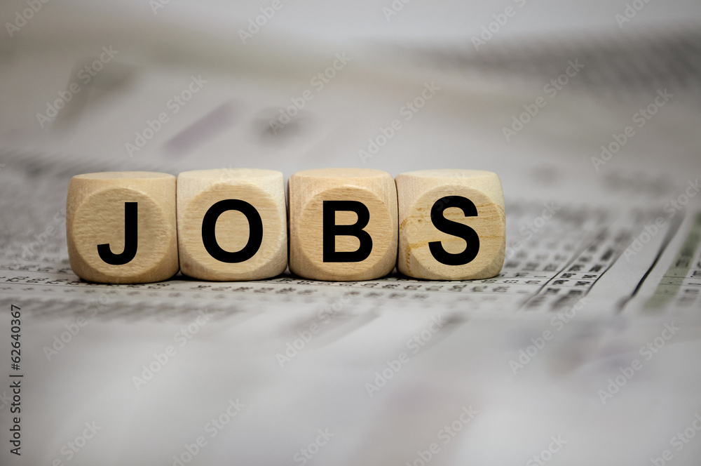 Jobs mit Würfel und Zeitung Stock-Foto | Adobe Stock