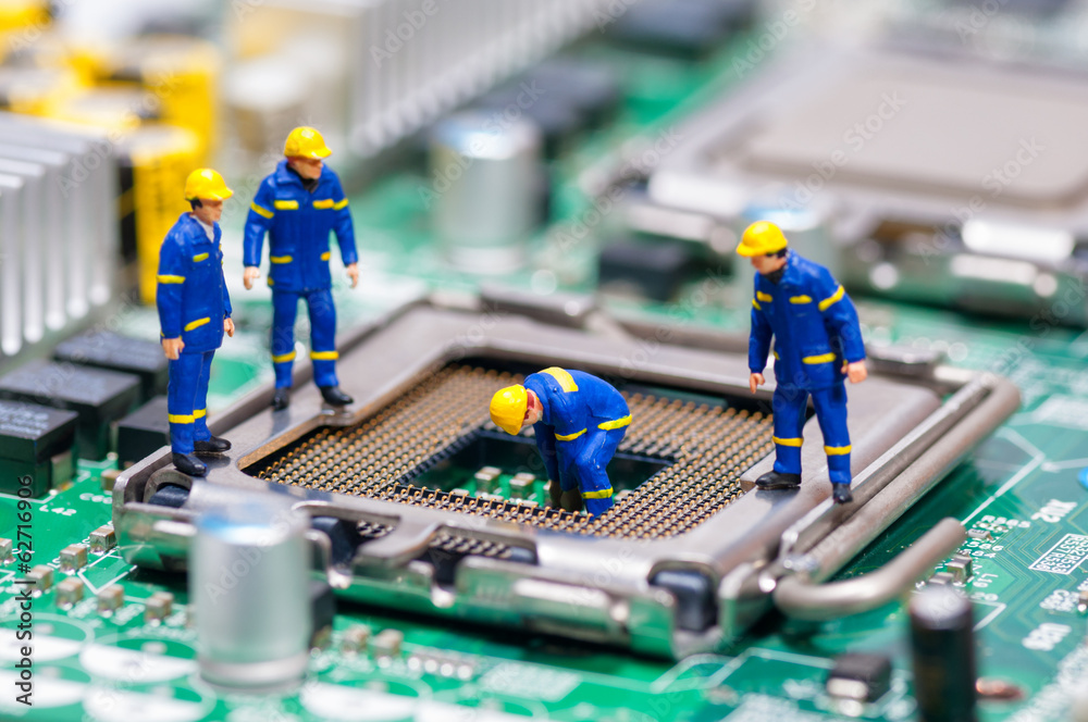 Group of construction workers repairing CPU foto de Stock | Adobe Stock