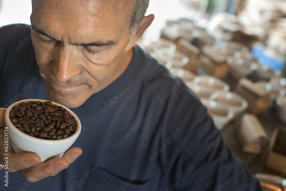 The sampling procedure in a coffee processing shed, where staff make ...