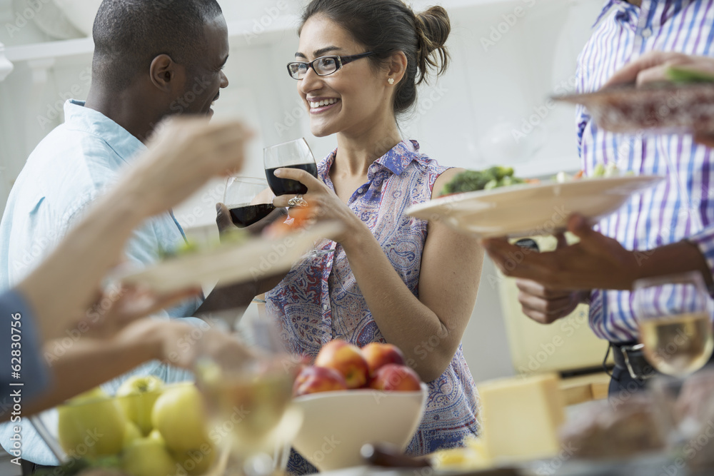 An open plan office in New York City. A working lunch, a salad buffet ...